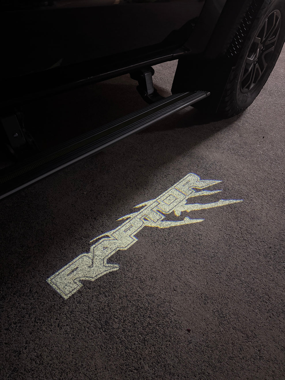 “Raptor”- Puddle Light/Welcome Light – Signature Lux